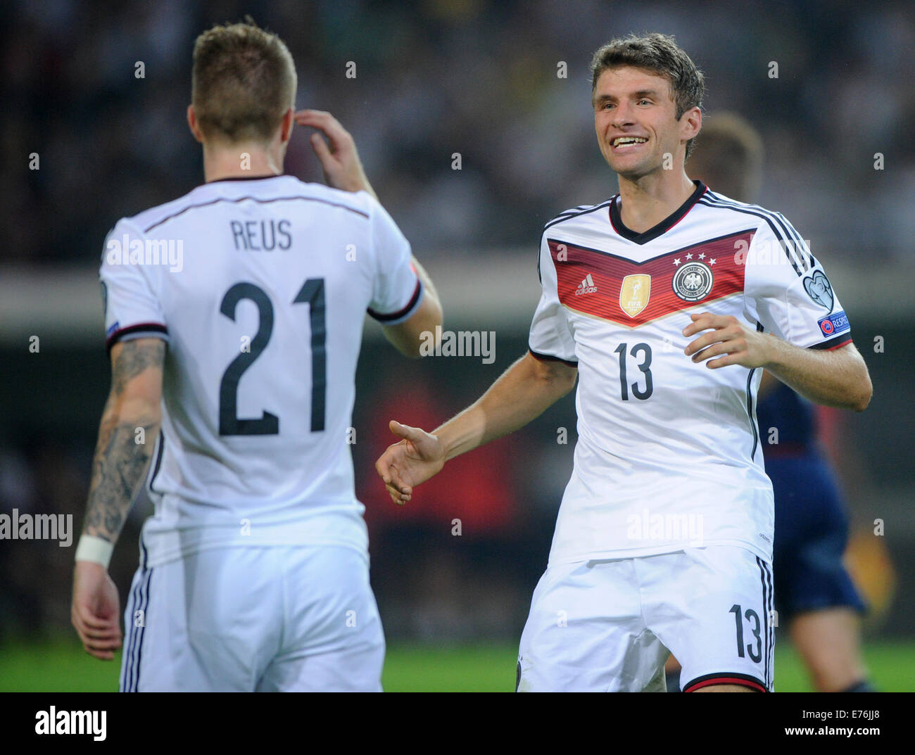 Germany's Thomas Mueller (R) and Marco Reus cheer during the UEFA EURO ...