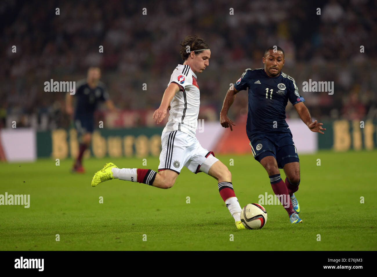 Dortmund, Germany. 07th Sep, 2014. Scotland's Ikechi Anya (R) and ...