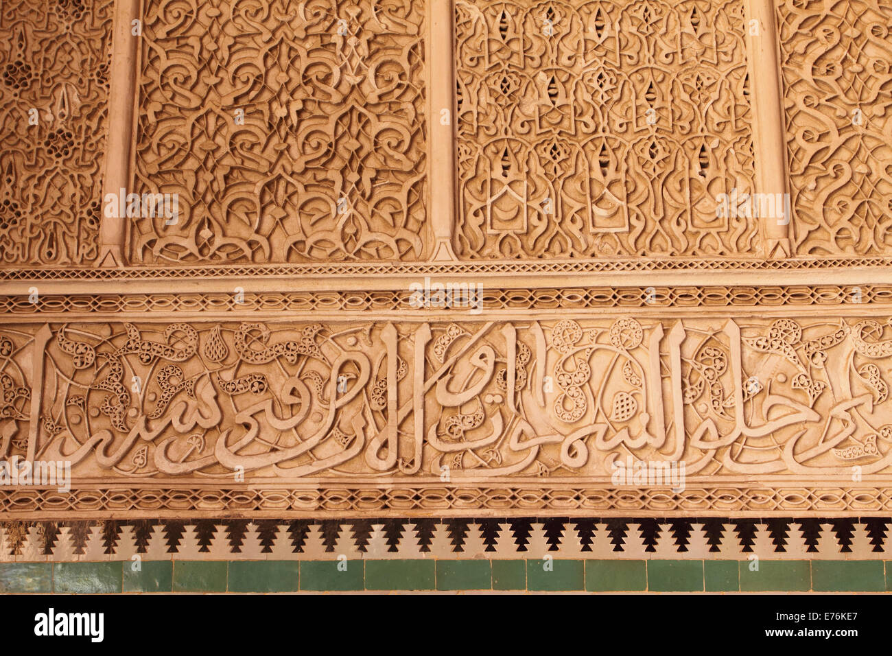 Fez Morocco intricate tile and calligraphic decoration in the courtyard ...