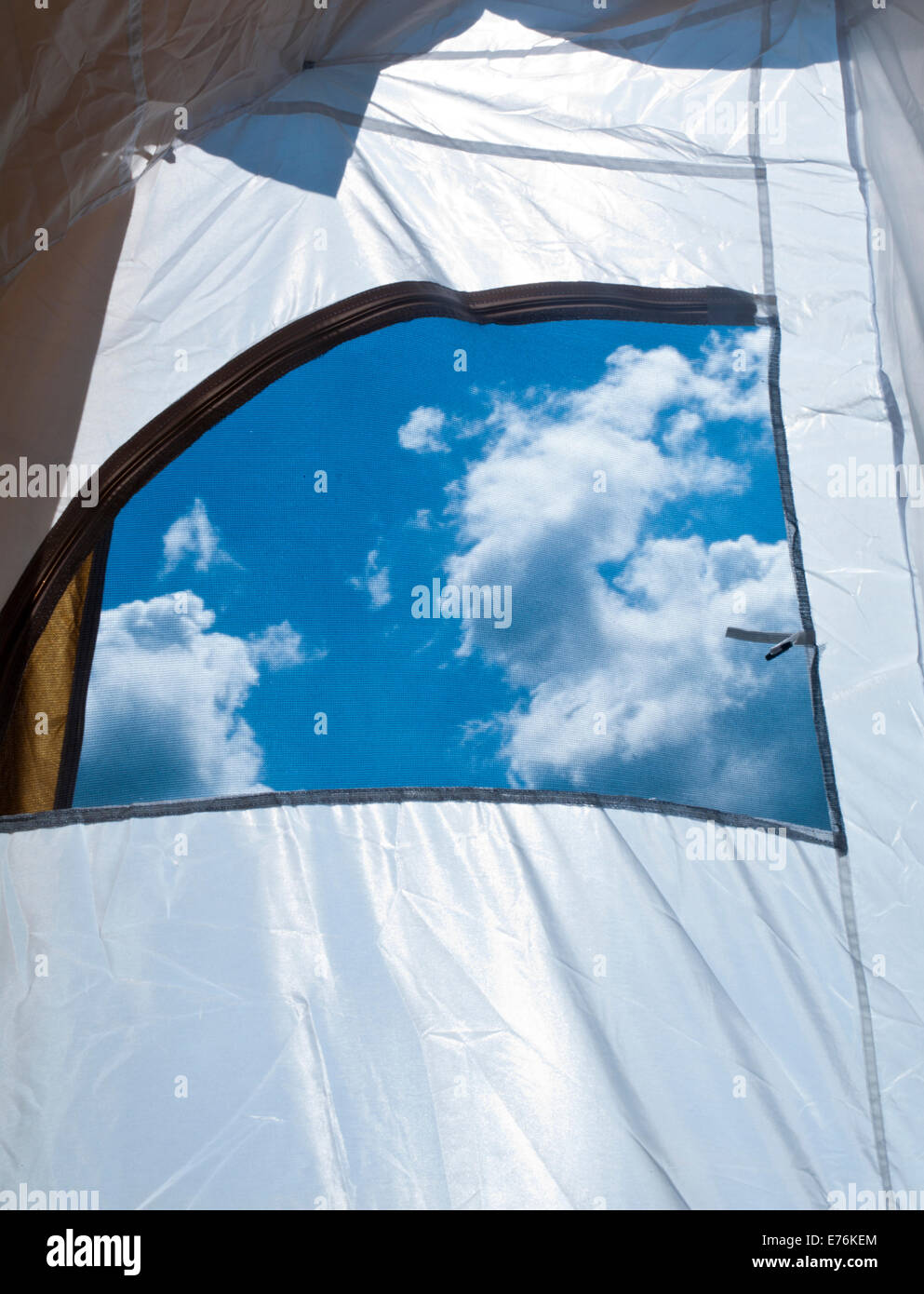 Blue sky through a tent window Stock Photo - Alamy