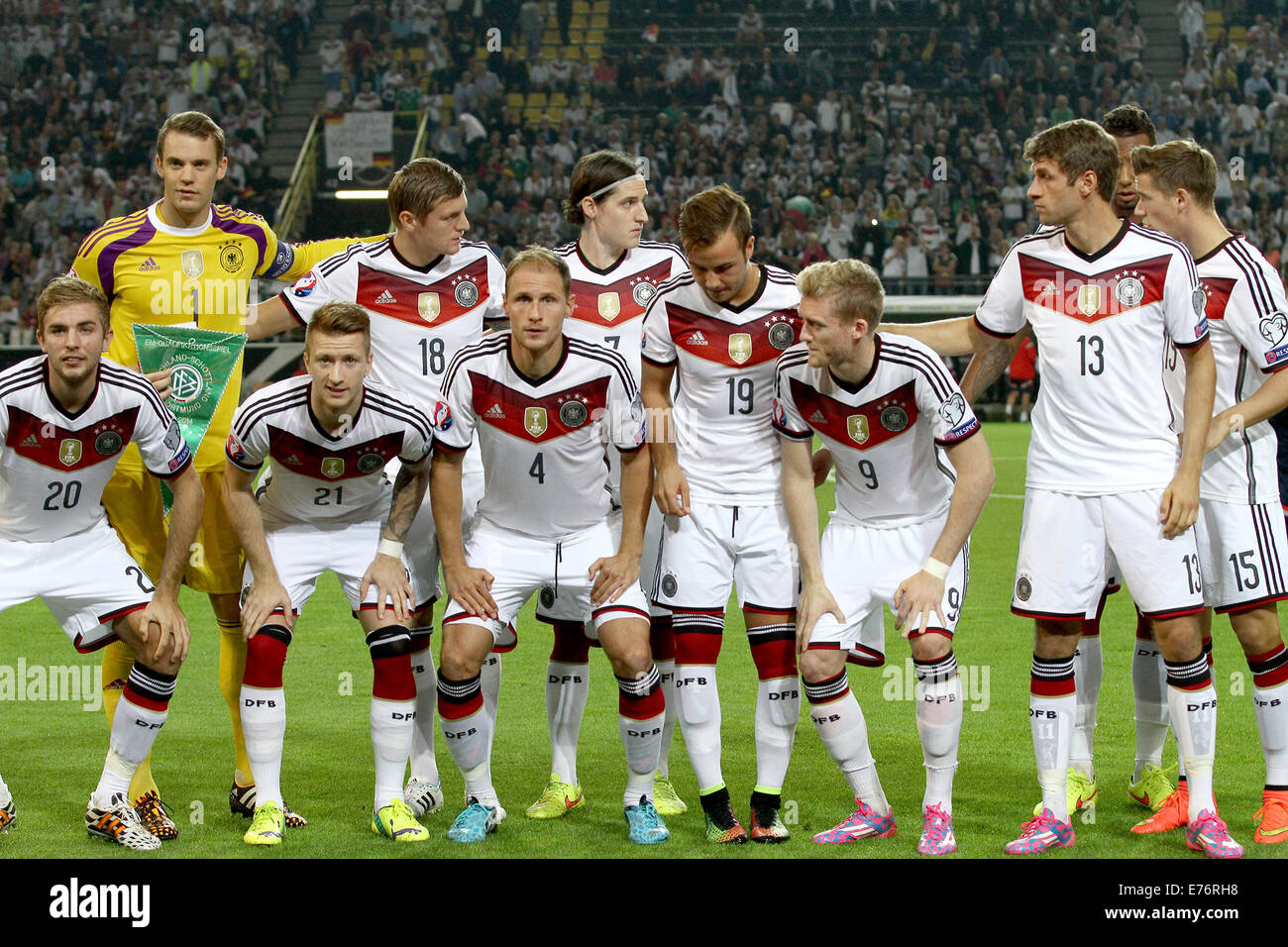 Germany's players (back L-R) goalkeeper Manuel Neuer, Holger Badstuber ...