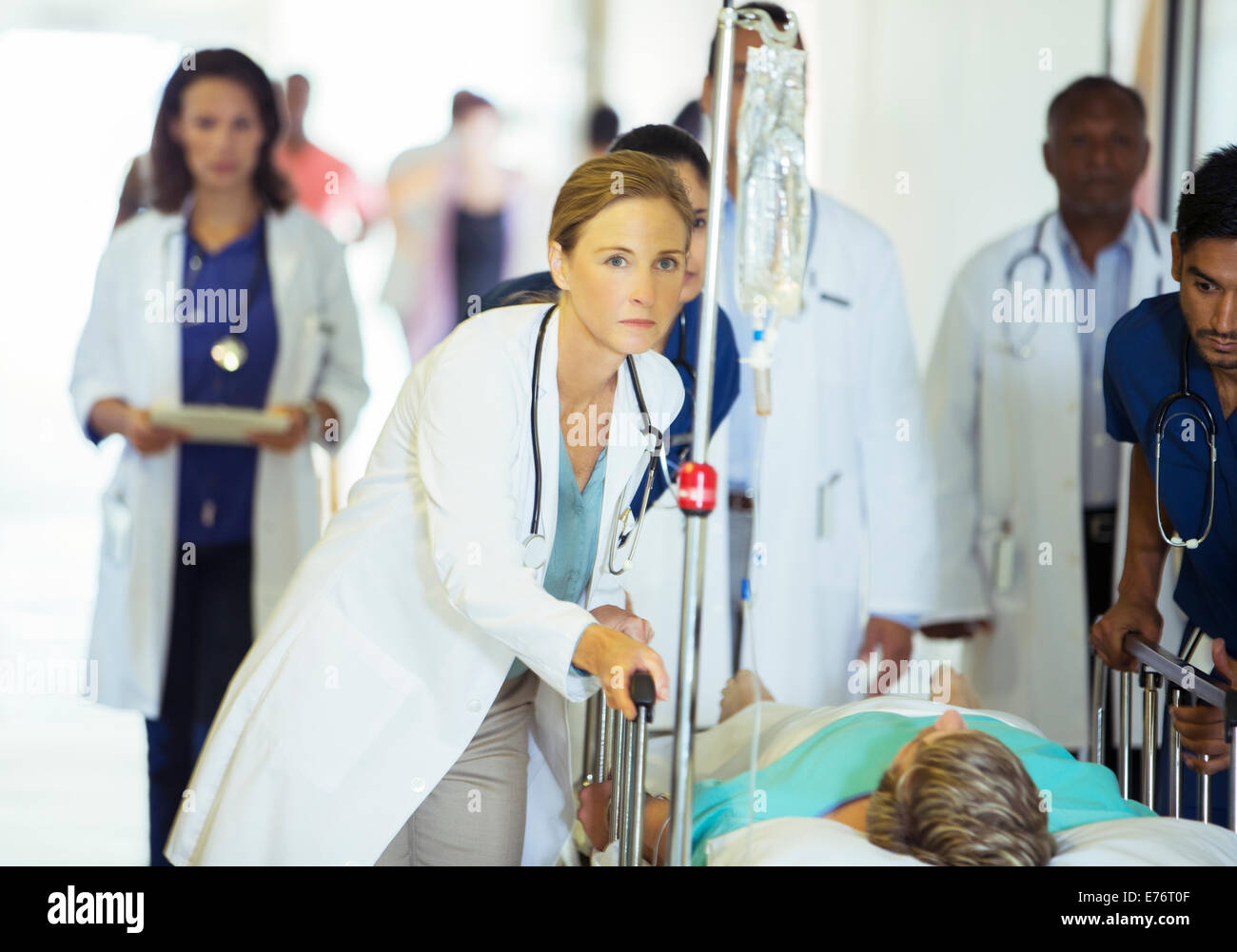 Doctors pushing patient on hospital hi-res stock photography and images ...