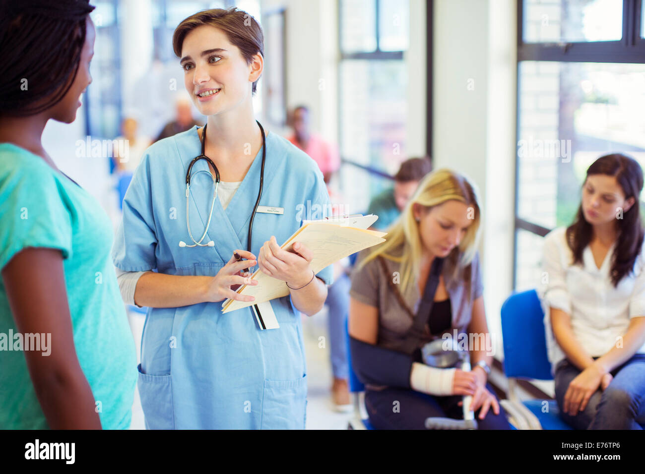 Nurse and patient talking in hospital Stock Photo - Alamy
