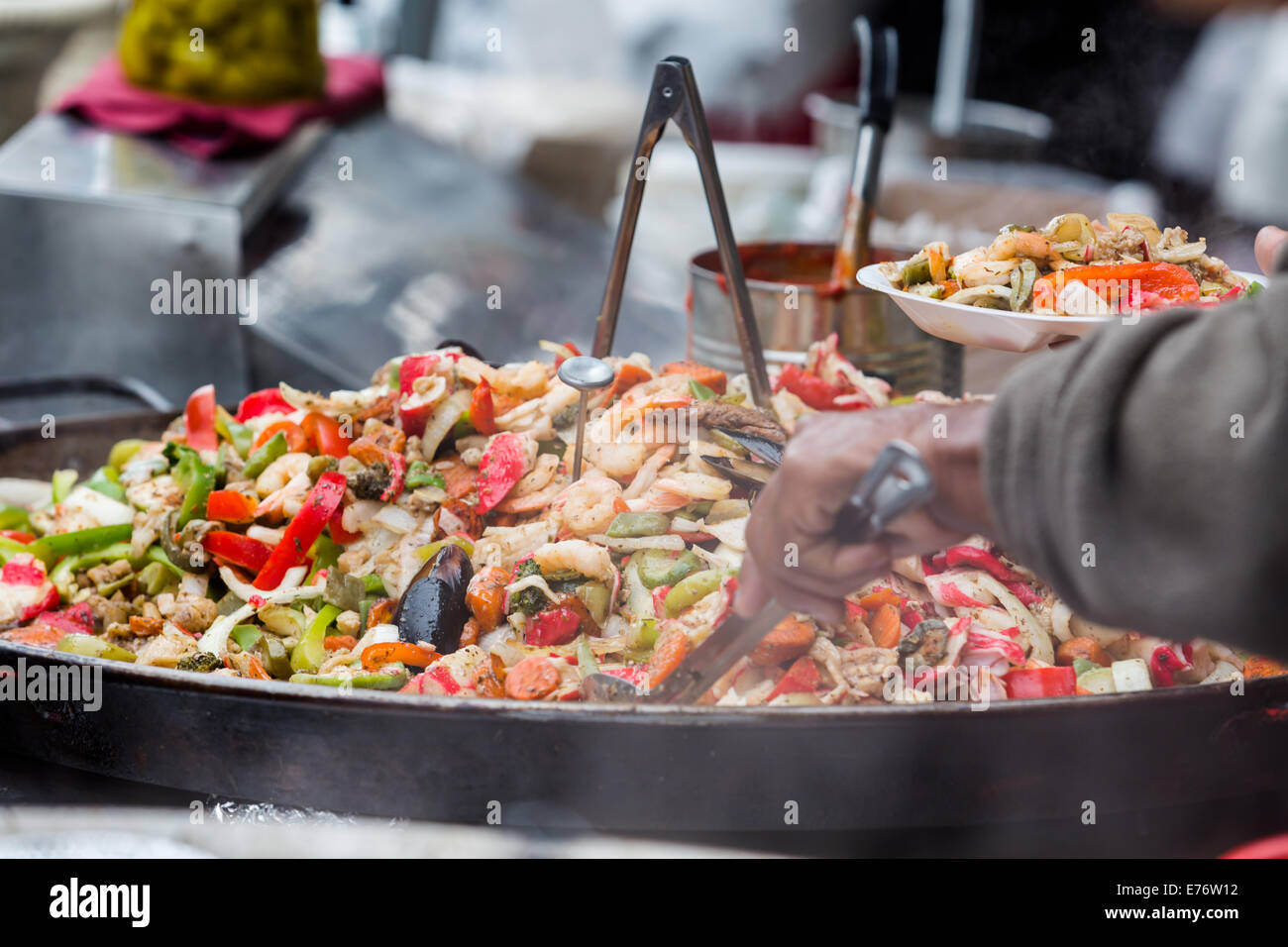 Cooking traditional Italian food in large quantaty for big party Stock ...