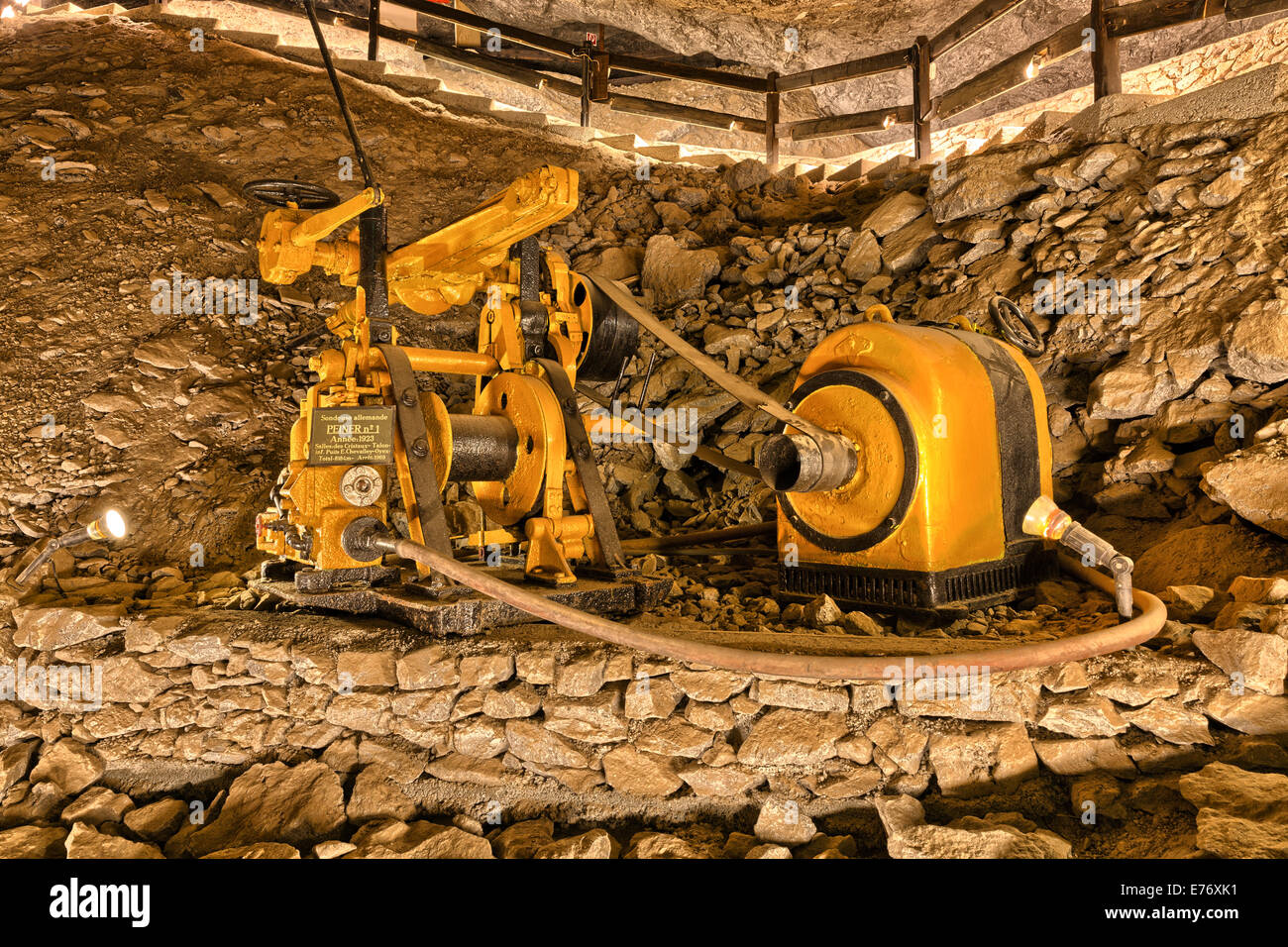 Visitor tour through the salt mine in Bex. Vintage drilling machine ...