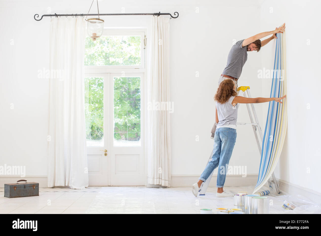 Hanging by arms hi-res stock photography and images - Alamy