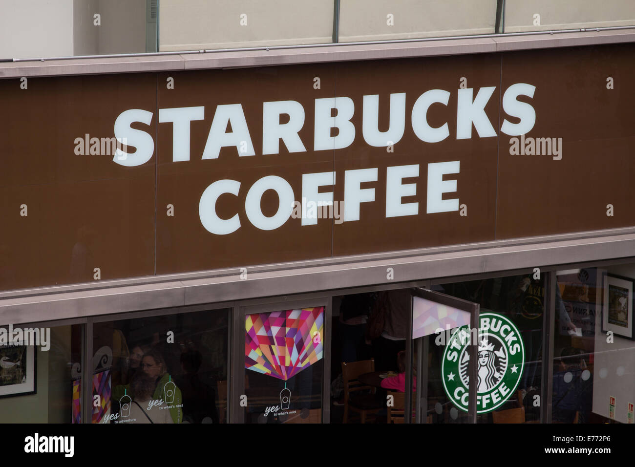 Starbucks Coffee sign at Tower Bridge London Stock Photo - Alamy