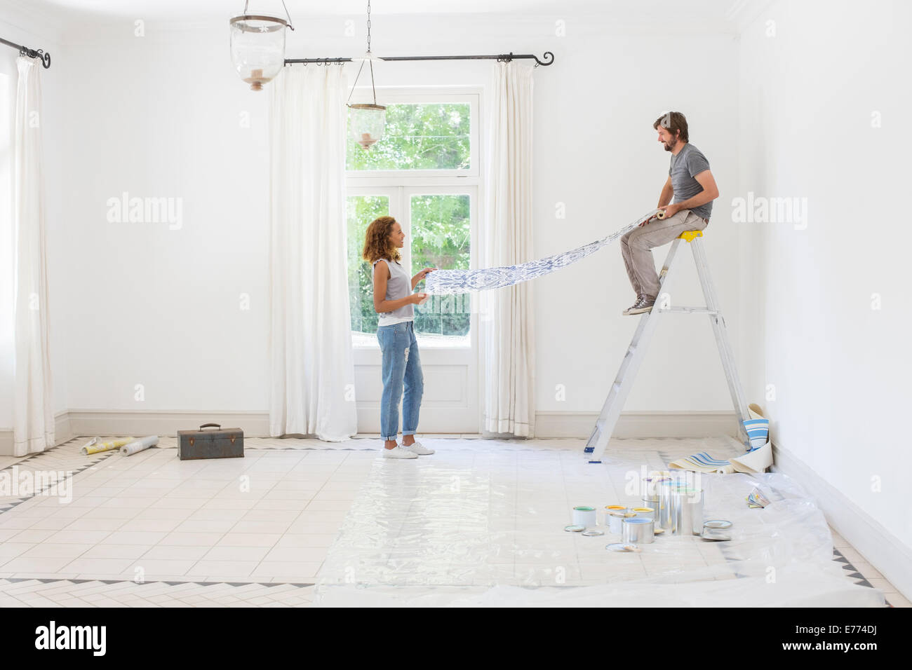 Laying laying out hi-res stock photography and images - Alamy