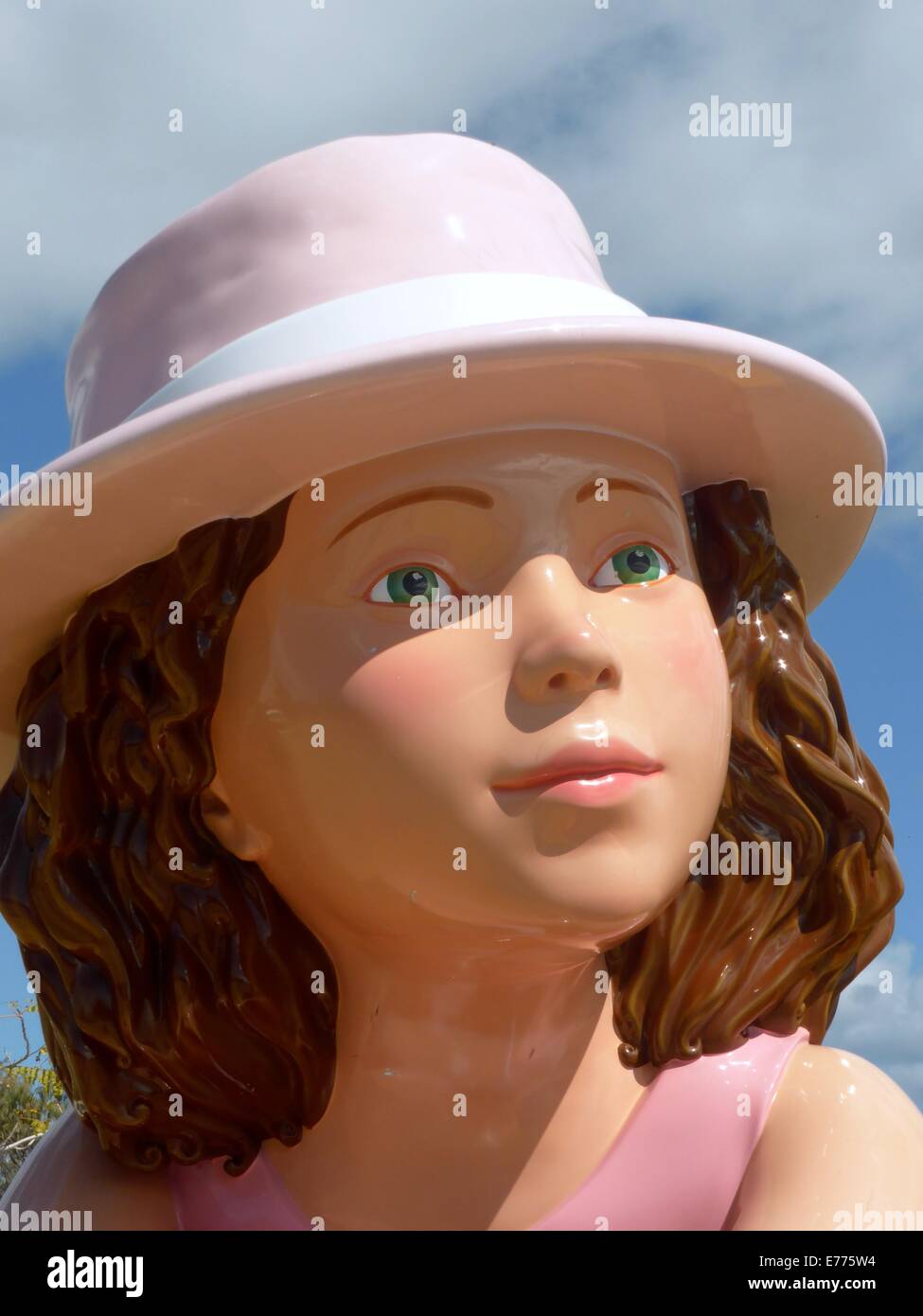 A closeup portrait of a plastic dummy depicting a woman or girl wearing ...