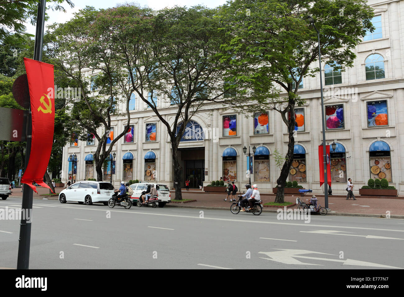 A communist pendant hangs from a lamp opposite the luxury -store in Ho ...