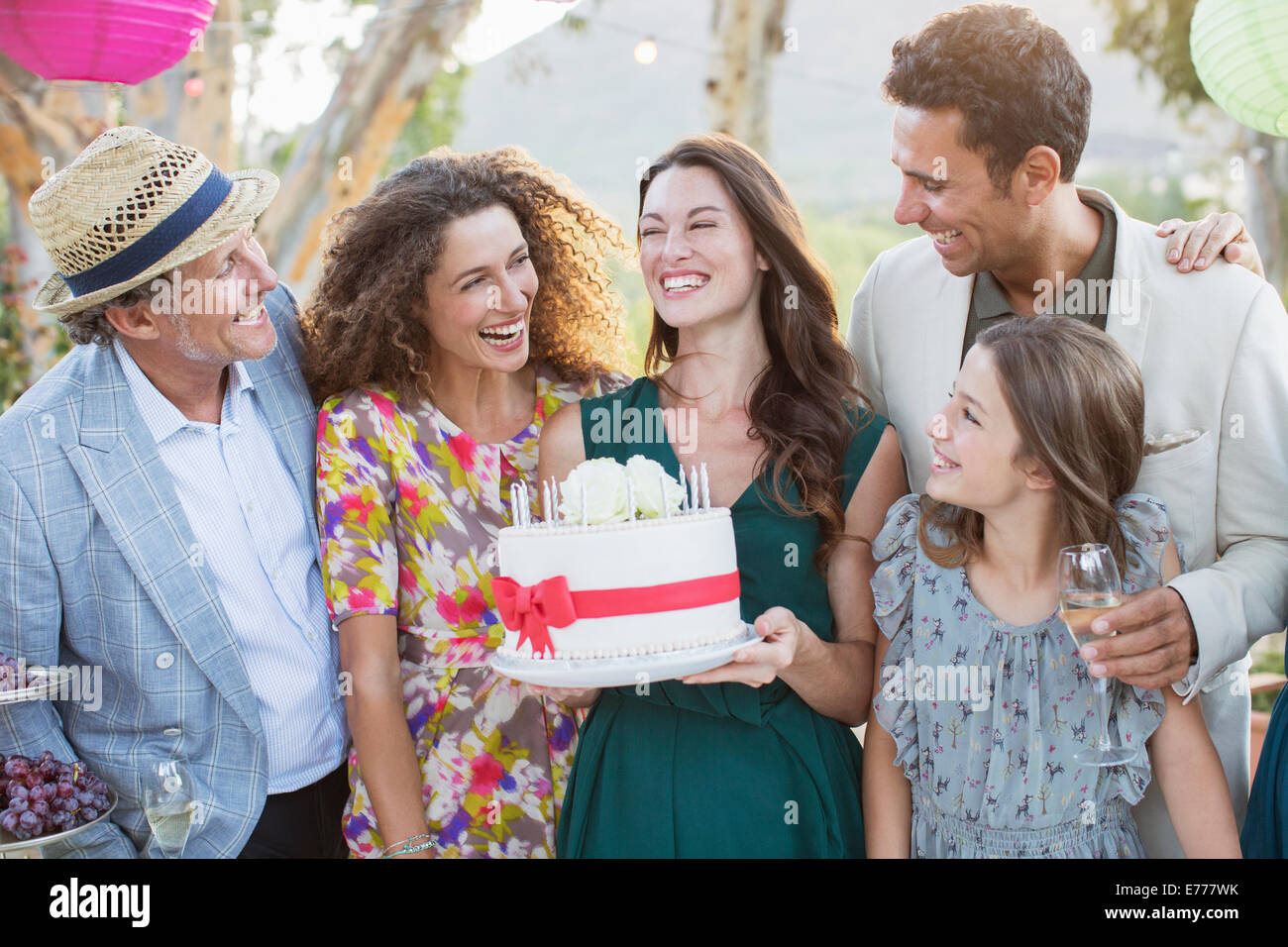 Family celebrating birthday together Stock Photo - Alamy