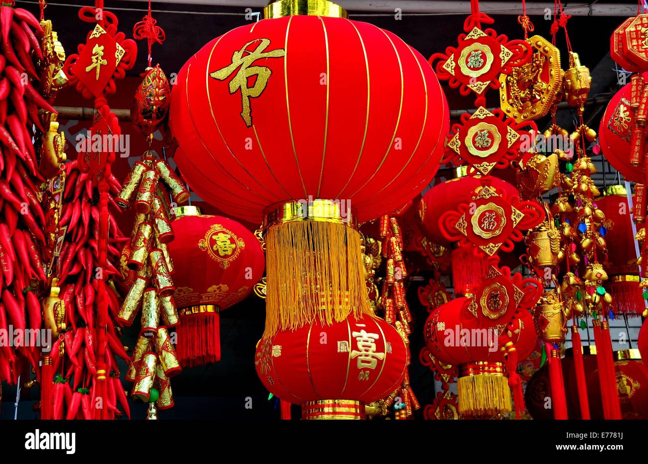 PENGZHOU, CHINA: Beautiful red fabric lanterns, strings of Chili ...