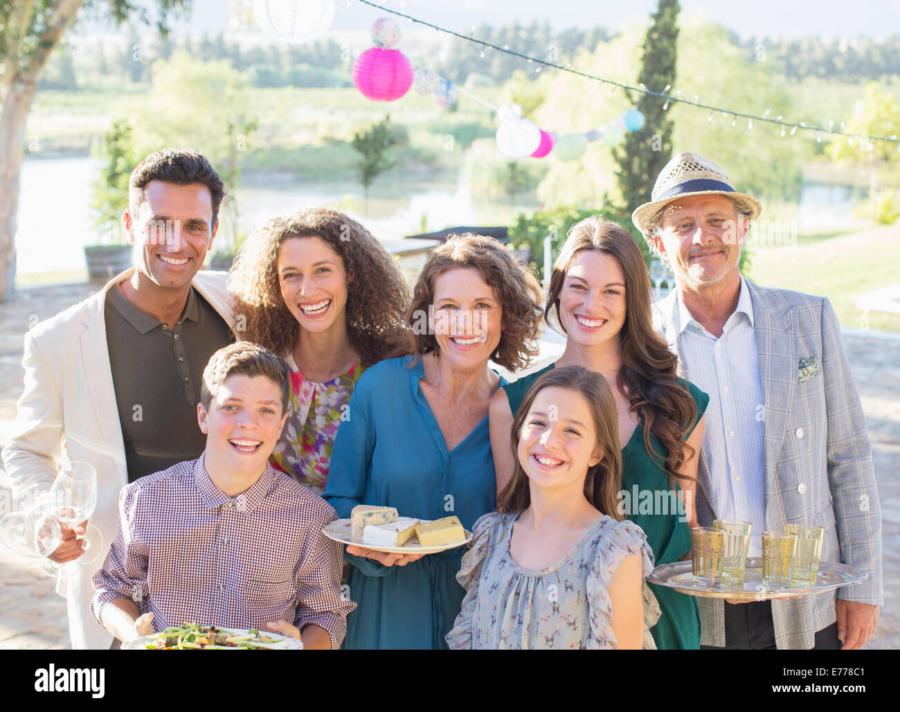Family smiling together outdoors Stock Photo - Alamy