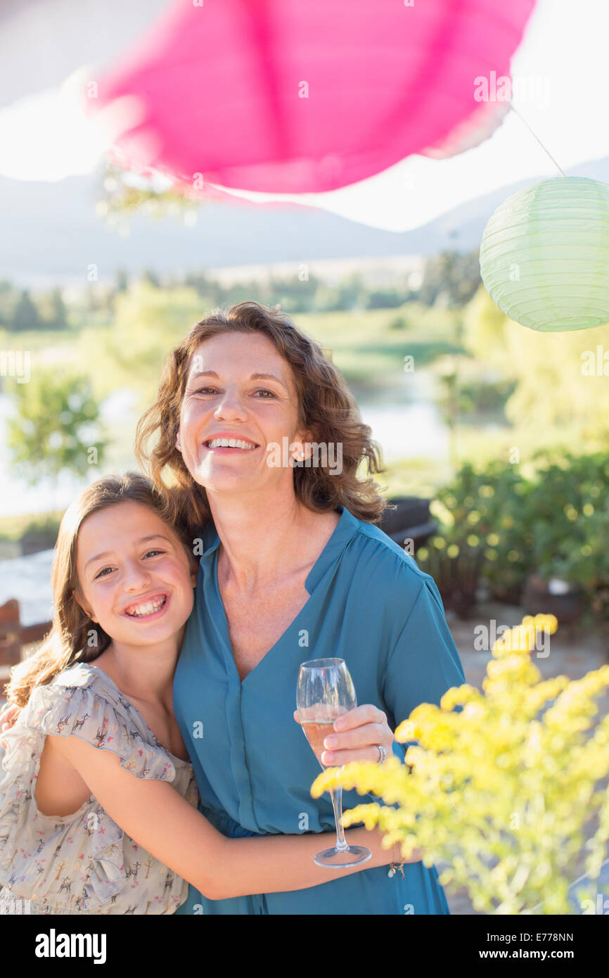 Affectionate mother and daughter hugging hi-res stock photography and images - Alamy