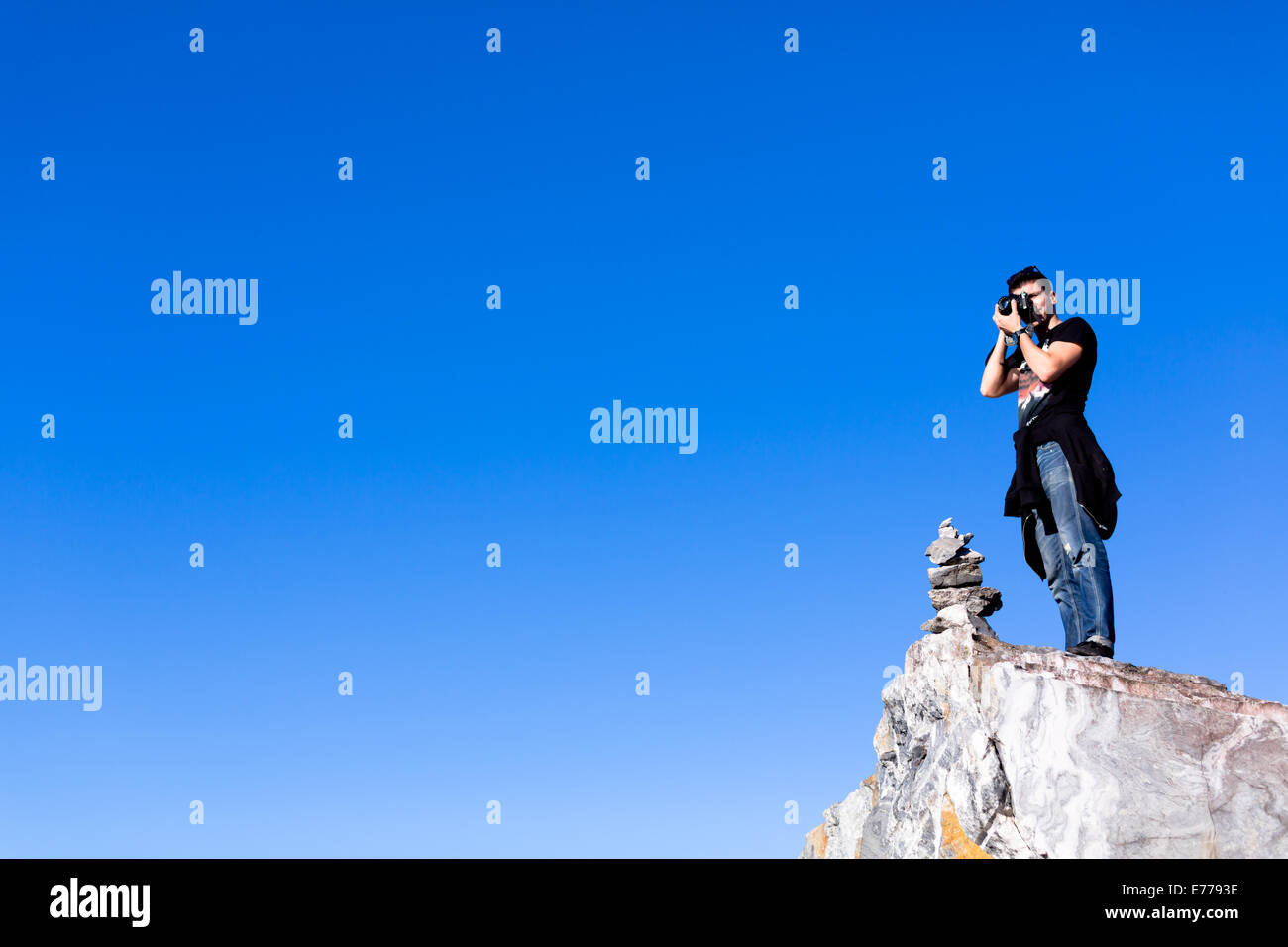 Man photographed at the camera Stock Photo - Alamy