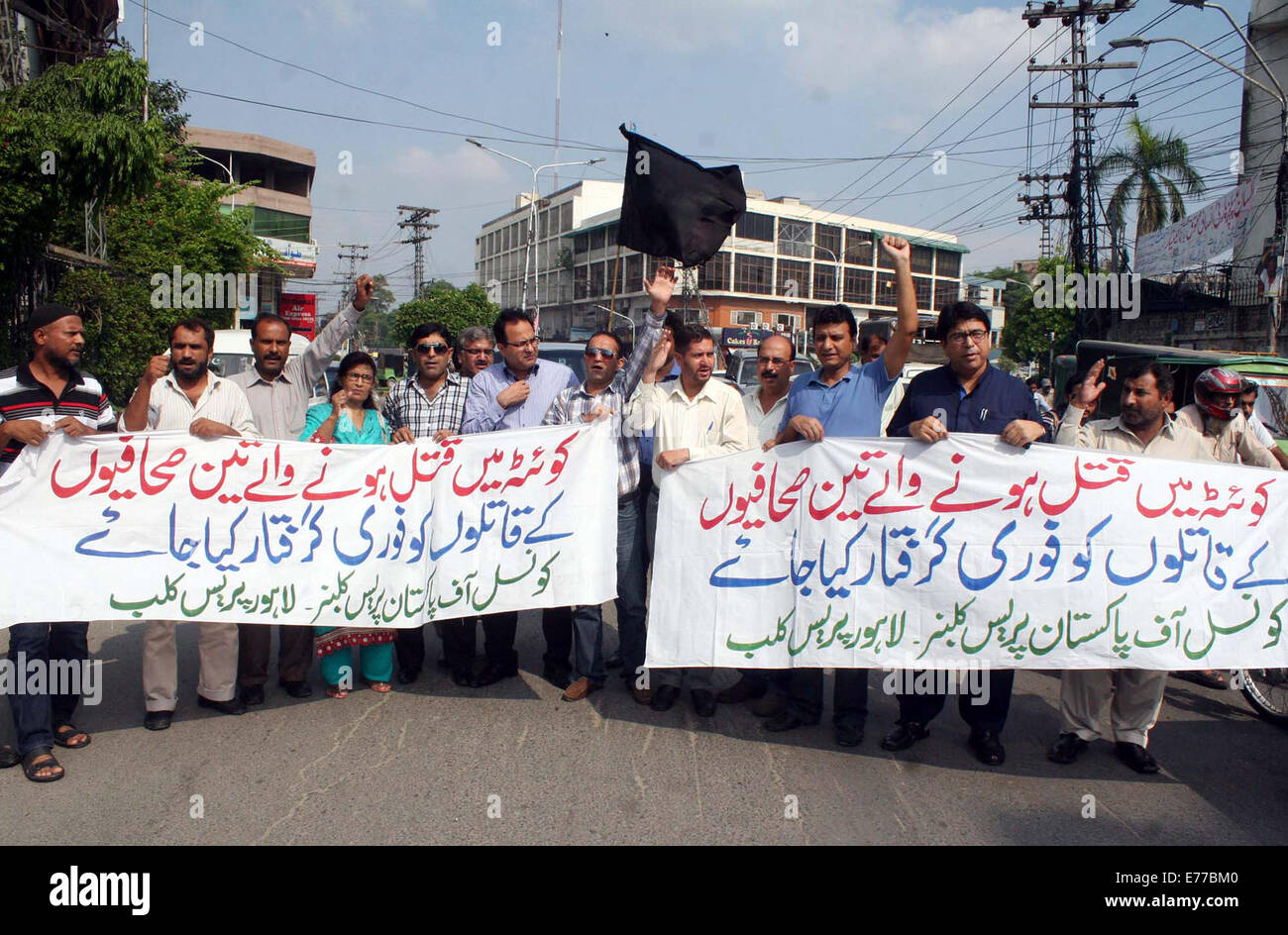 Members of Council of Pakistan Press Clubs and Lahore Press Club chant ...