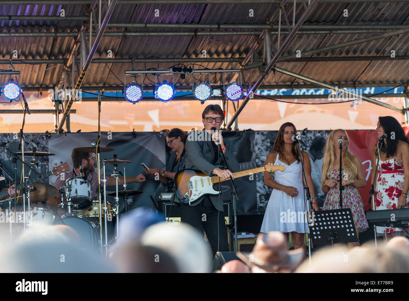Lyme Regis Dorset England. Billy Geraghty takes to the stage and ...