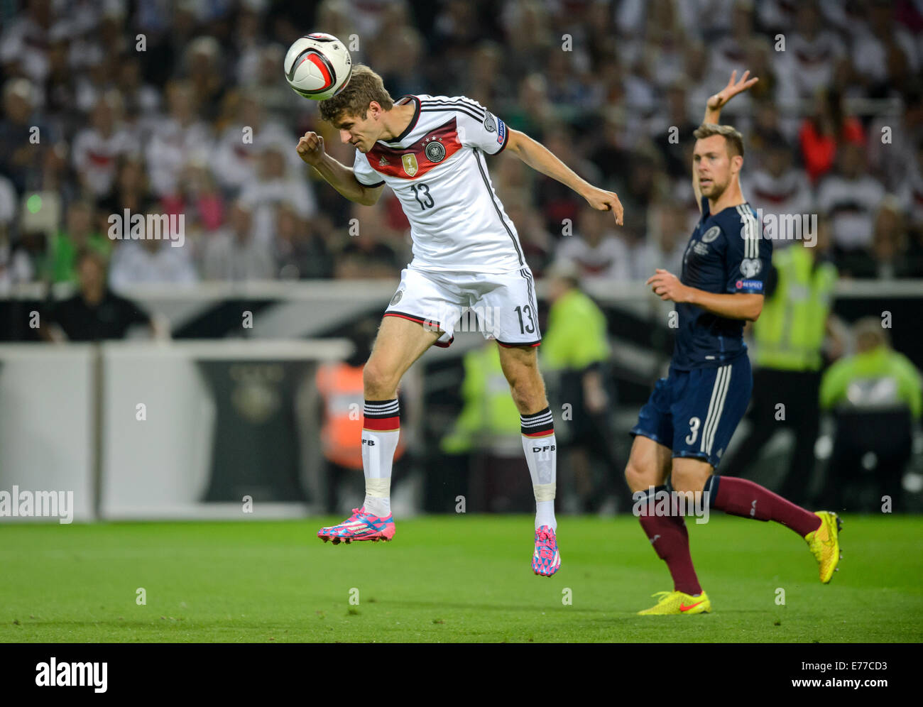 Dortmund, Germany. 07th Sep, 2014. Germany's Thomas Mueller (L) and ...