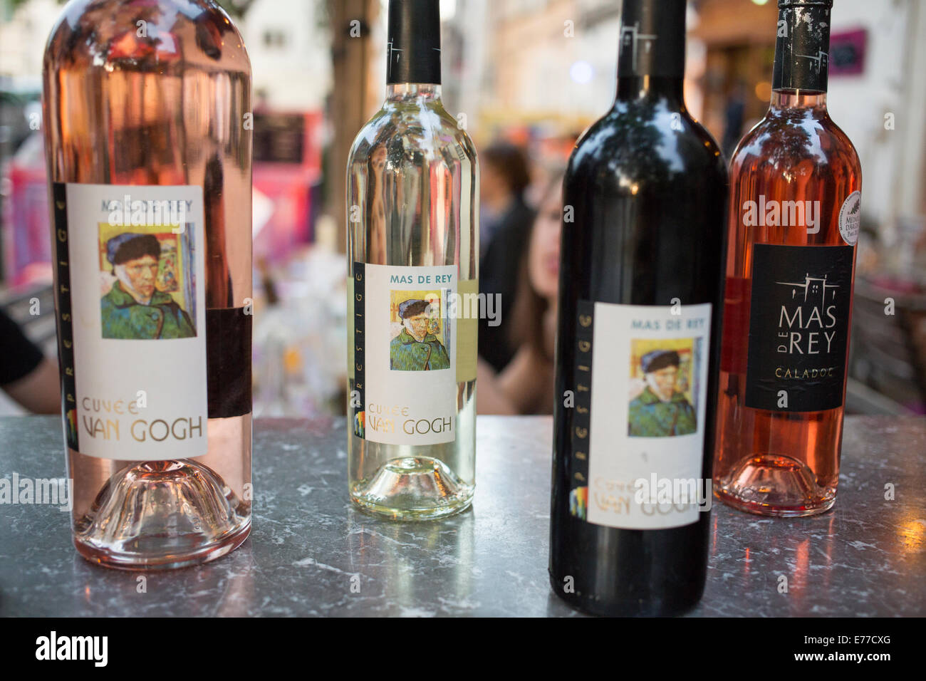 Wine bottles with painter Van Gogh's name on array outside restaurant ...