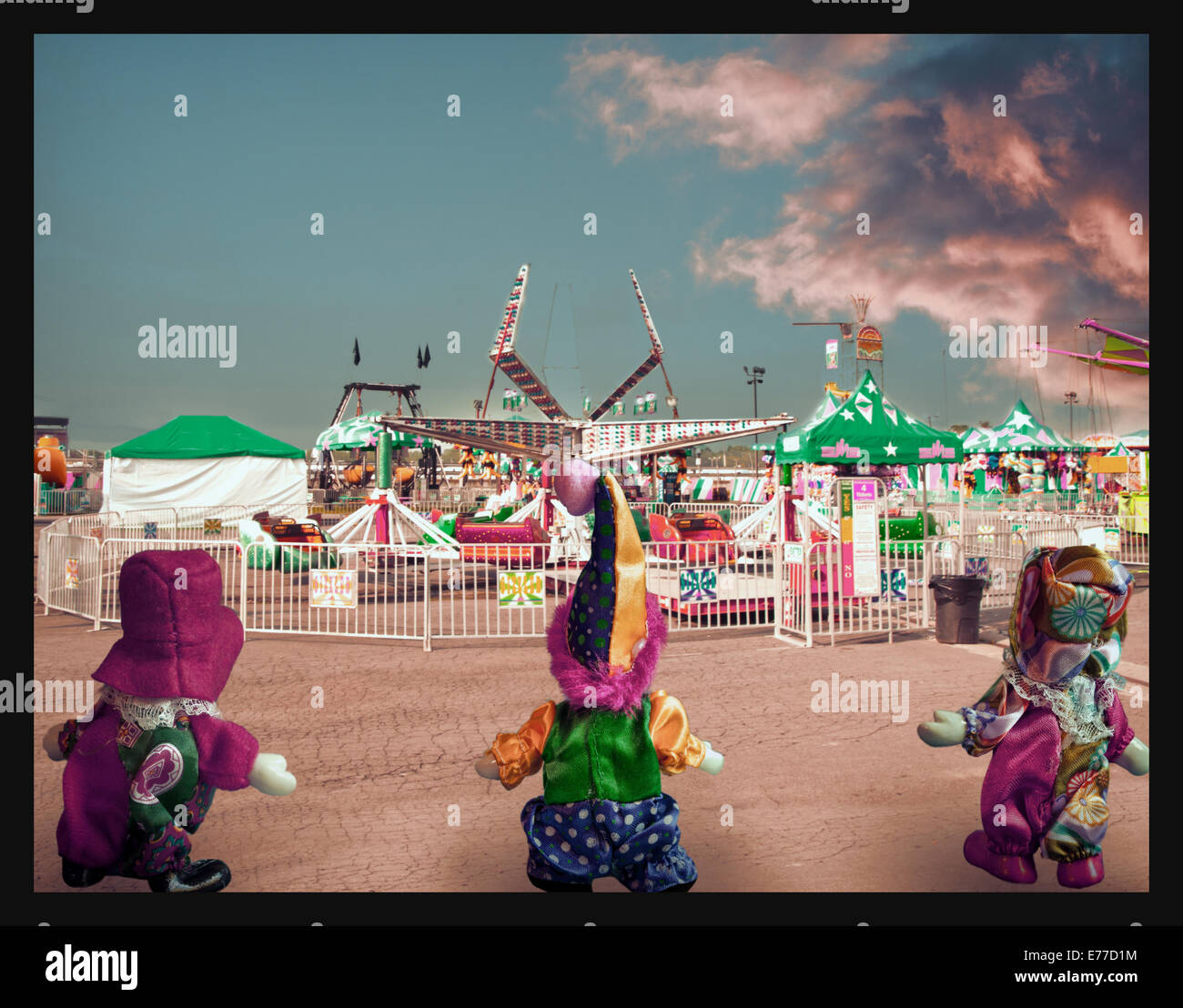 little clowns at a fair depiction Stock Photo - Alamy