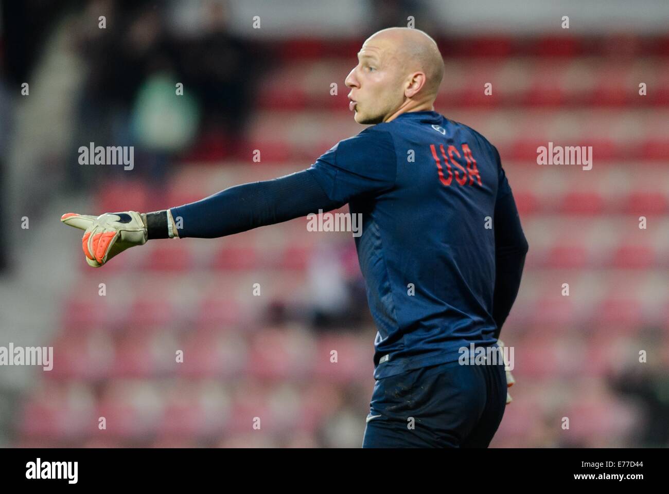 USA's goalkeeper Brad Guzan warms up before the friendly soccer match ...