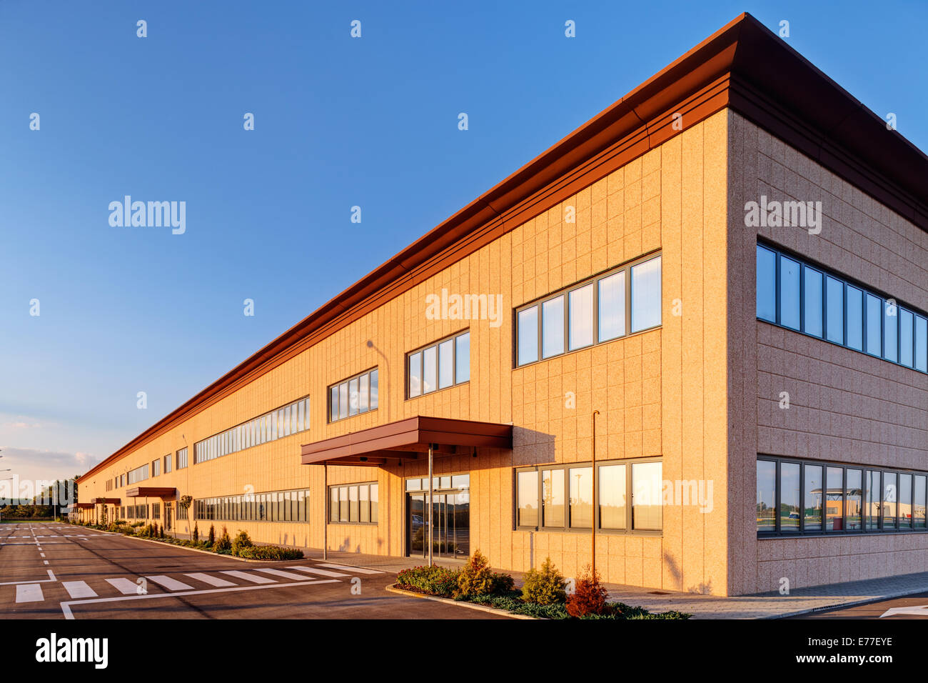 Exterior of industrial building on a sunny day Stock Photo - Alamy