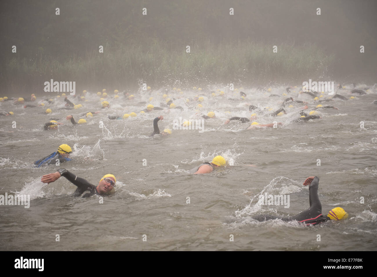 Misty cold start to open water race swimming poor visibility in lake ...