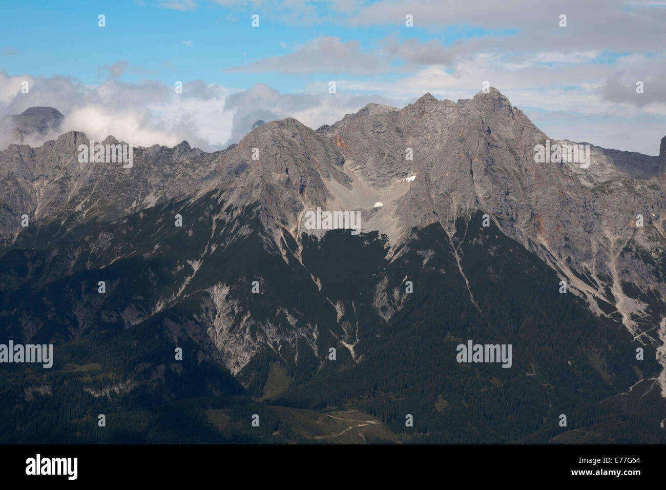 Cloud building beneath the summits of The Steineres Meer Alps above ...