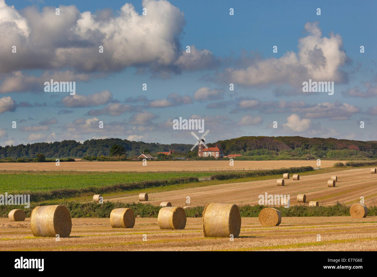 Harvest landscape with straw bales and the windmill at Weybourne ...