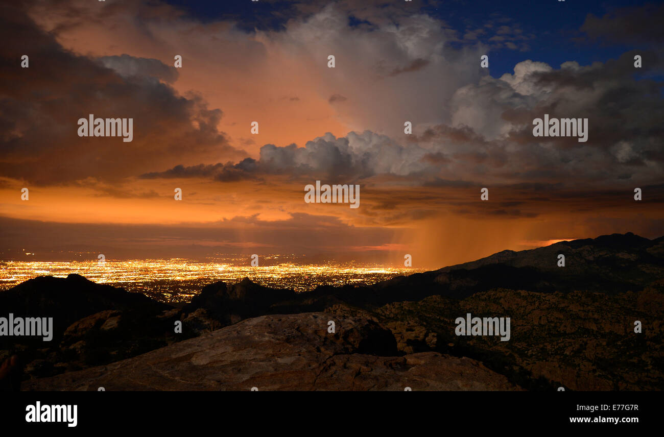 Visitors to Windy Point on Mount Lemmon take in a monsoon sunset and ...
