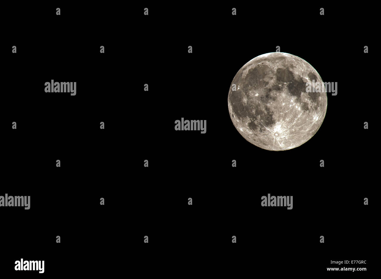 Harvest Moon shining in night sky Stock Photo - Alamy