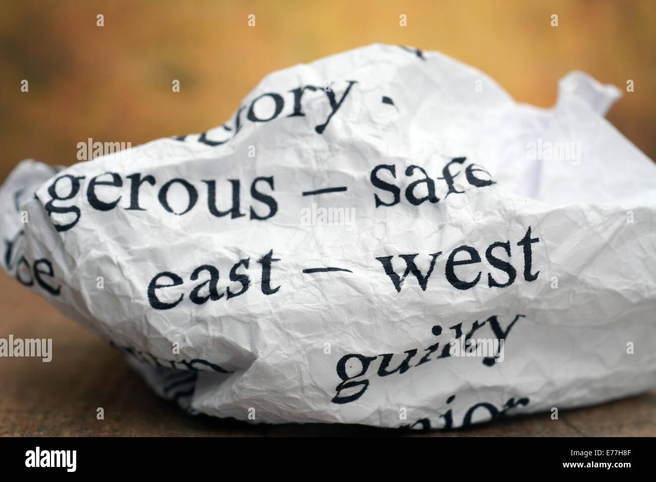 East - west text on paper Stock Photo - Alamy