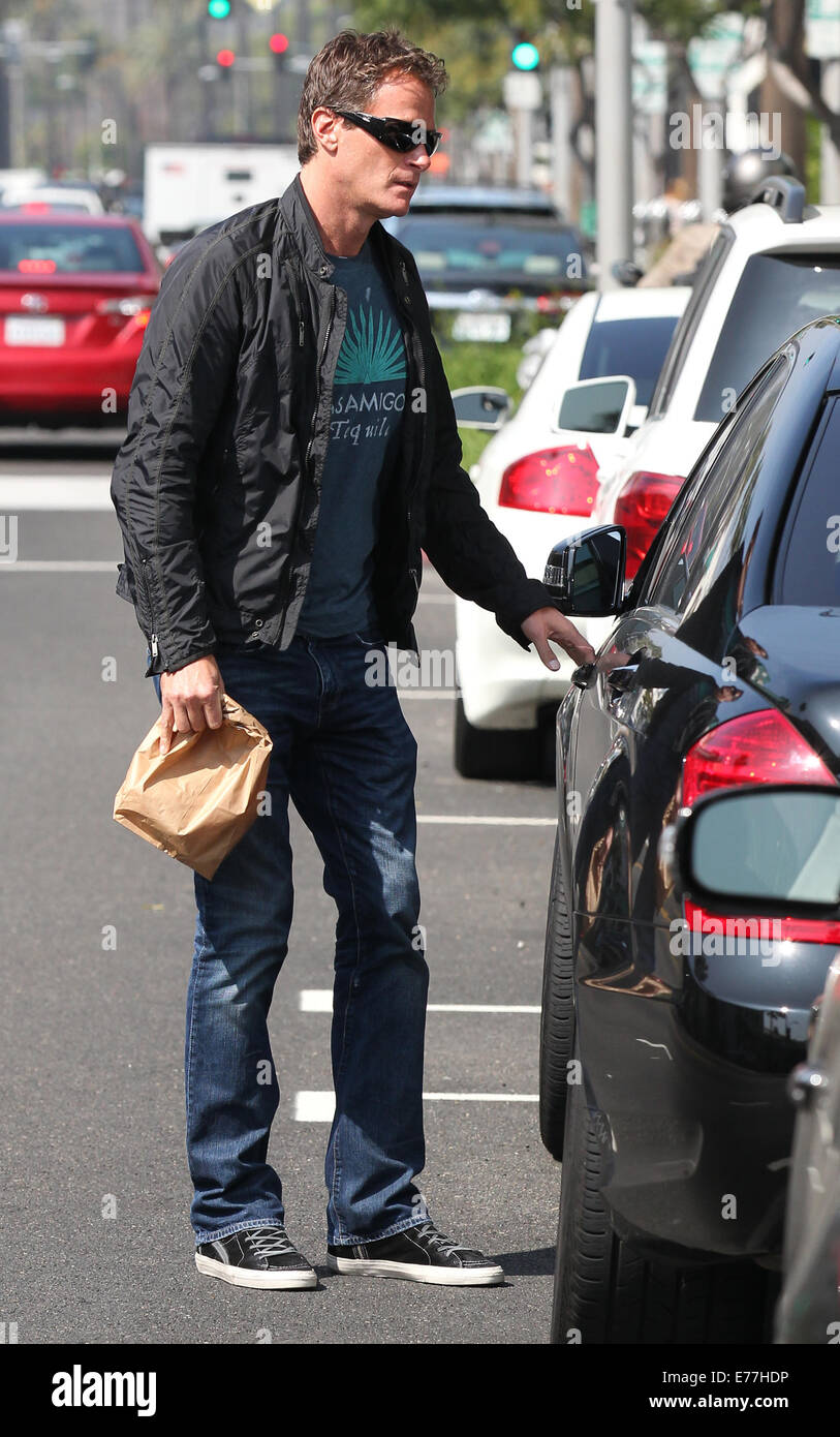 Rande Gerber returns to his car after taking a walk in a sunny Beverly ...