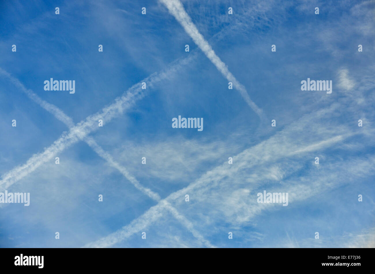 Airplane trails in sky near hi-res stock photography and images - Alamy
