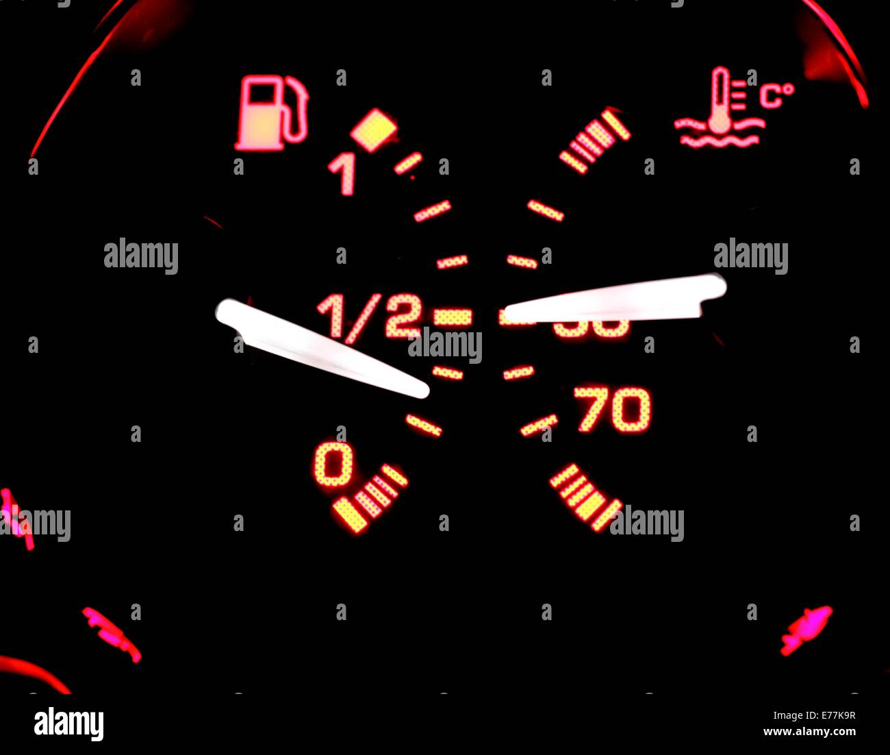 Illuminated fuel and temperature gauge gage england uk Stock Photo - Alamy
