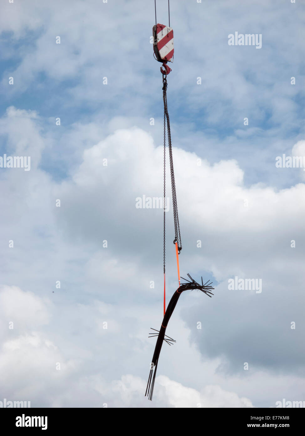 Lifting steel bars Stock Photo - Alamy