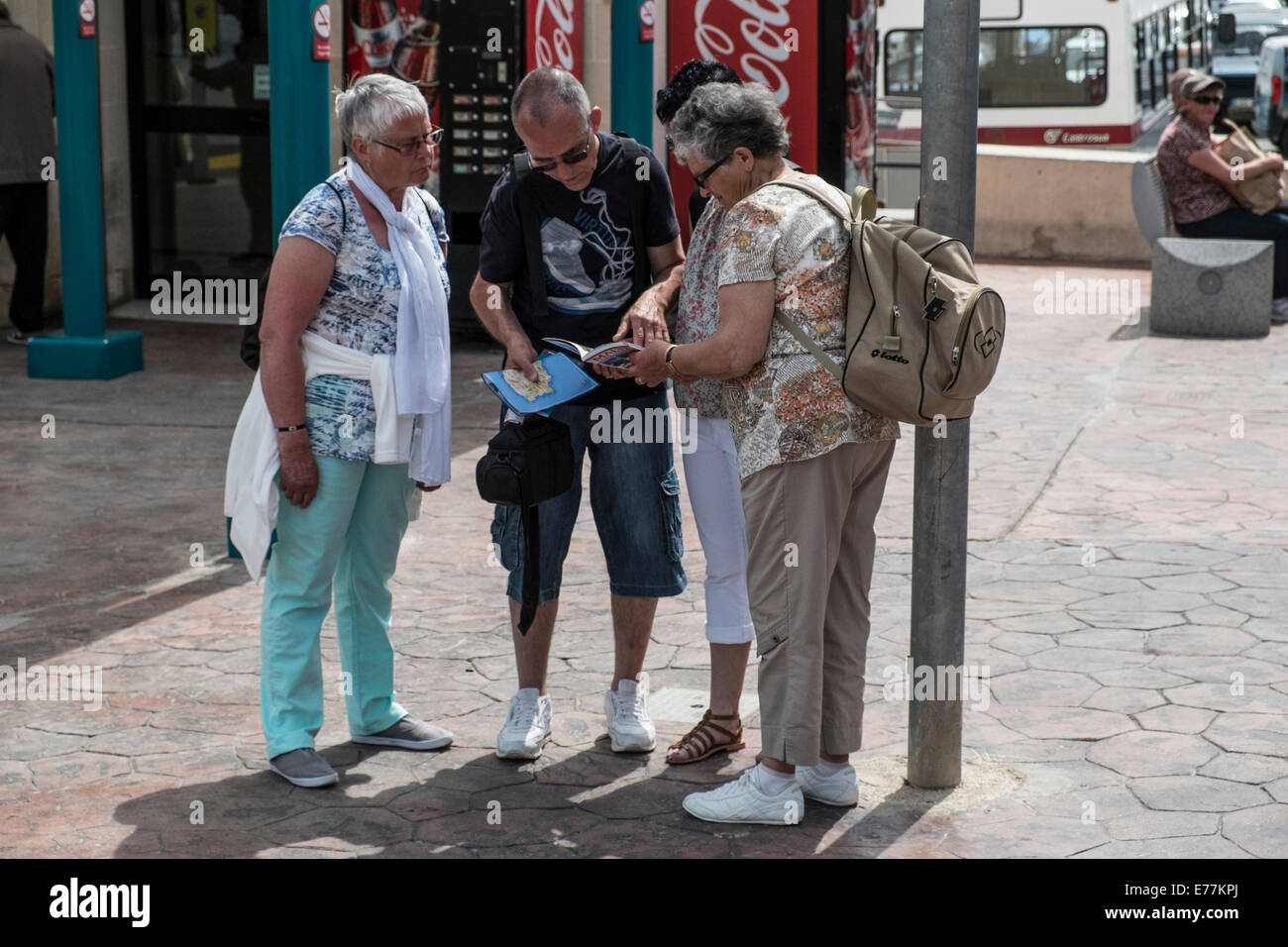 Holidays map reading in the capital of Gozo, Victoria Stock Photo - Alamy