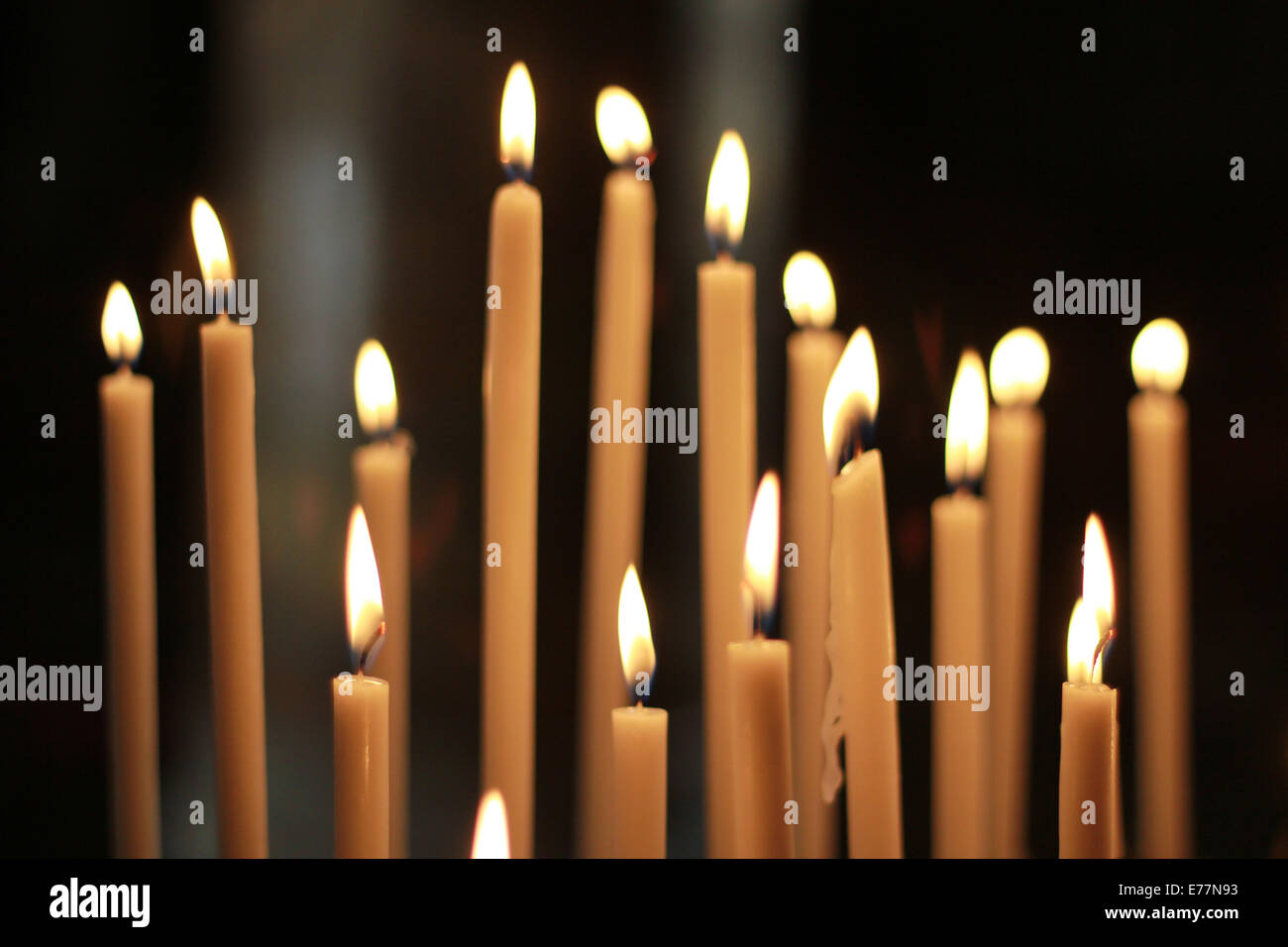 Burning candles at Church Stock Photo - Alamy