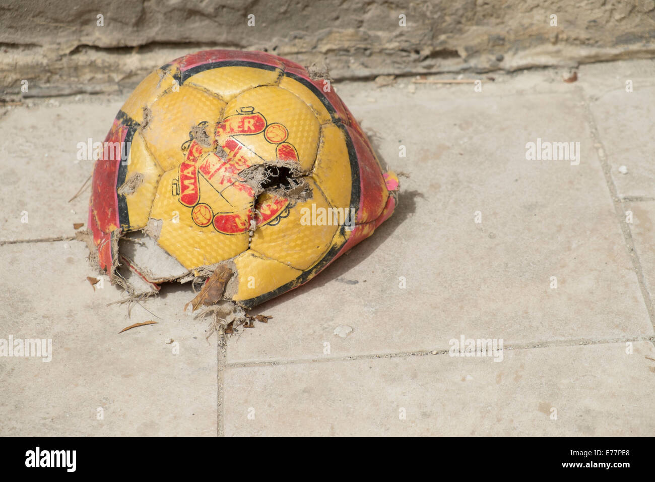 Punctured Manchester United Football Stock Photo - Alamy