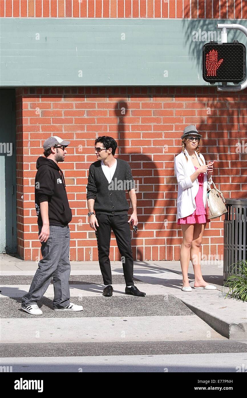 Corey Feldman dressed in the style of Michael Jackson with black shoes ...