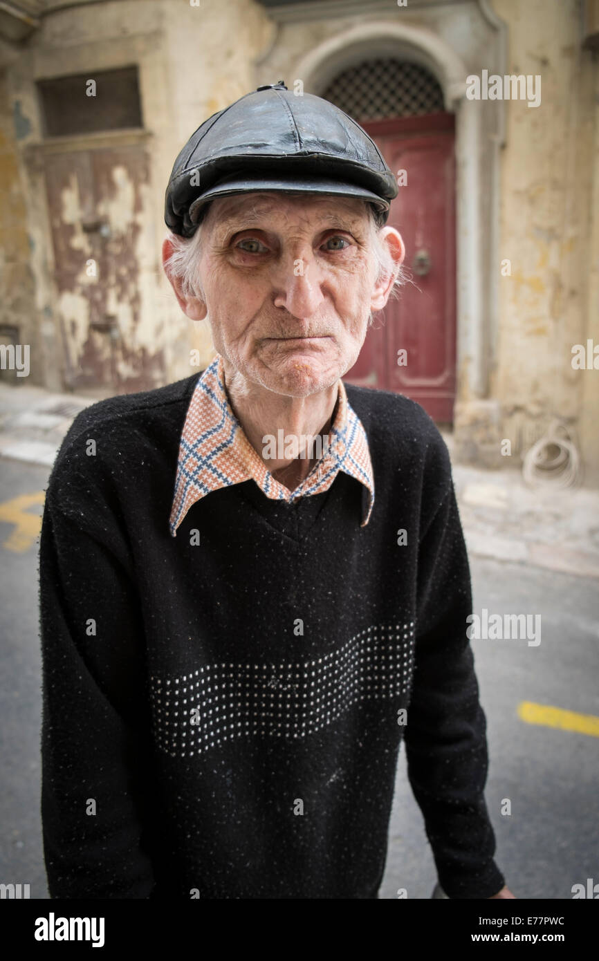 Elderly gentleman wearing a leather cap Stock Photo - Alamy