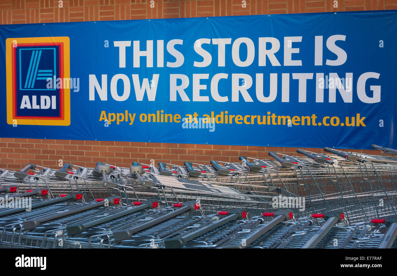 Recruiting banner outside Aldi supermarket. UK Stock Photo - Alamy