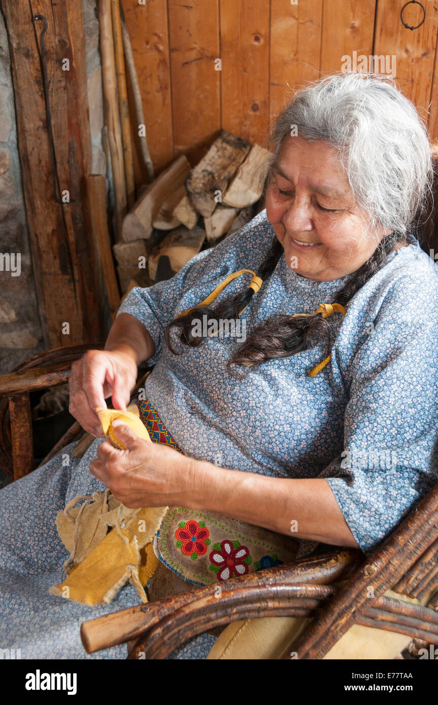American indian woman sewing hi-res stock photography and images - Alamy