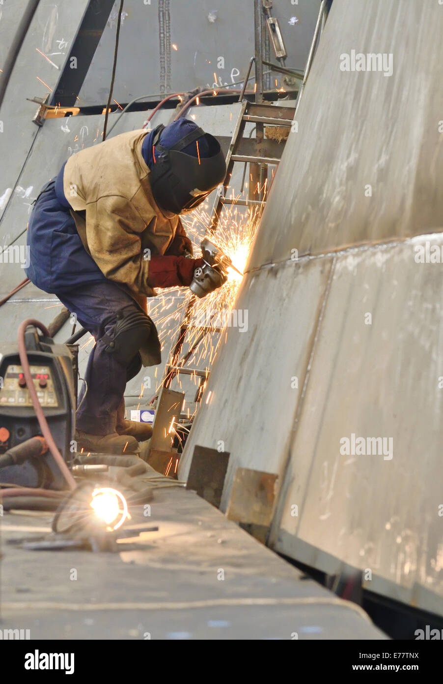 woman worker grinding a ship Stock Photo - Alamy