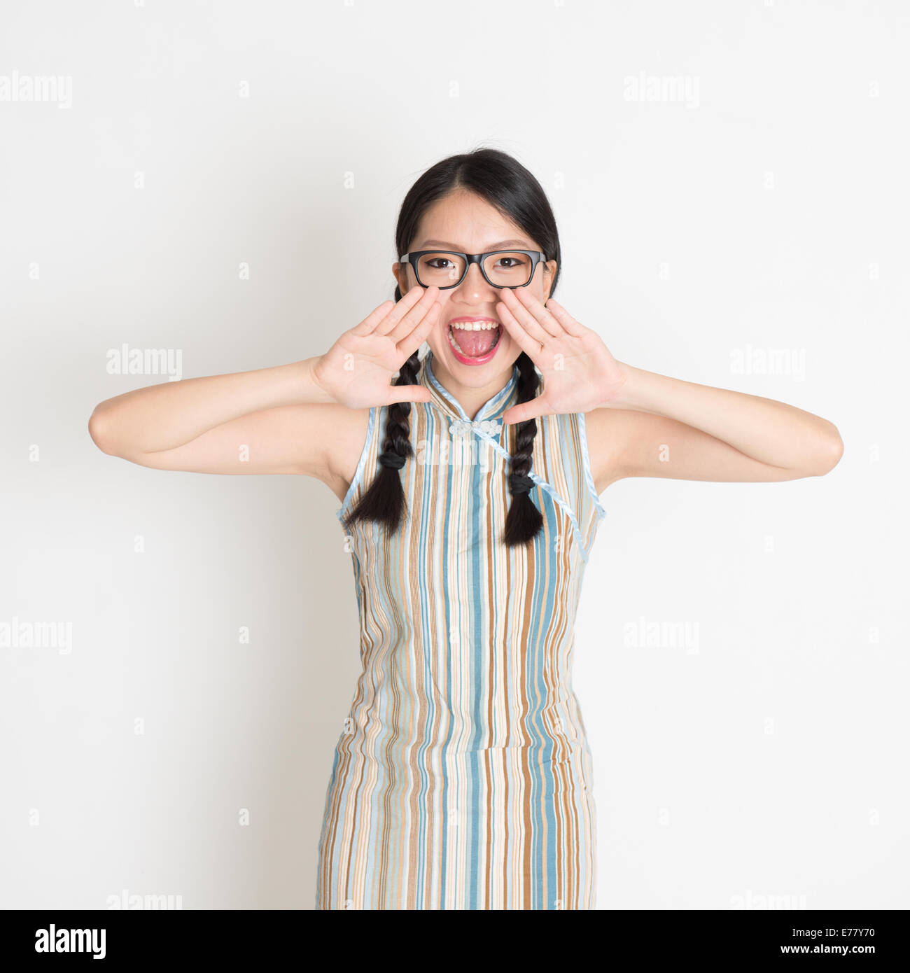 China girl shouting happy chinese hi-res stock photography and images ...