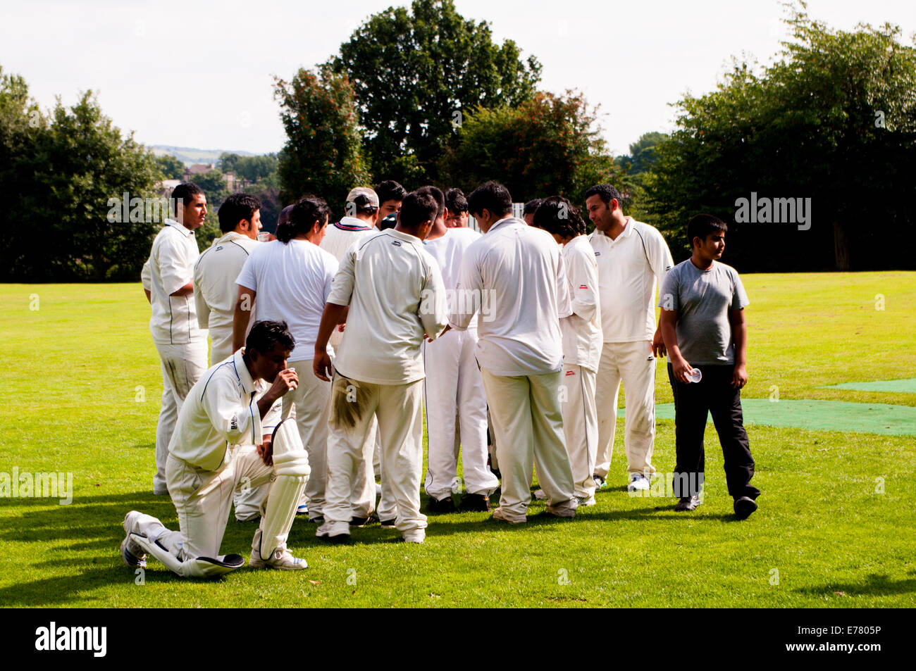 Asian Cricket team during a drinks break Stock Photo - Alamy