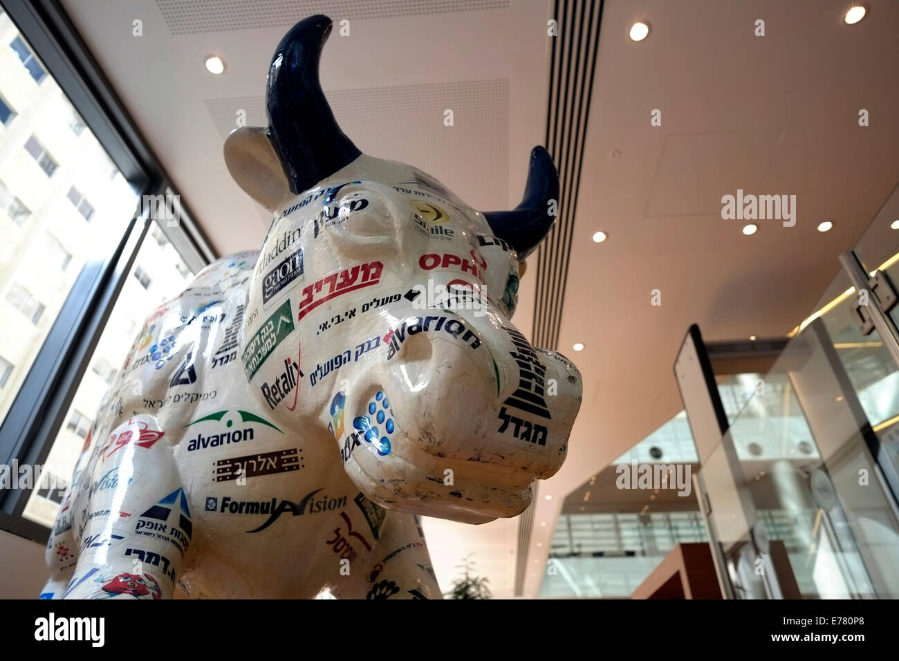 A sculpted bull depicting Israeli economy with labels and logos of ...