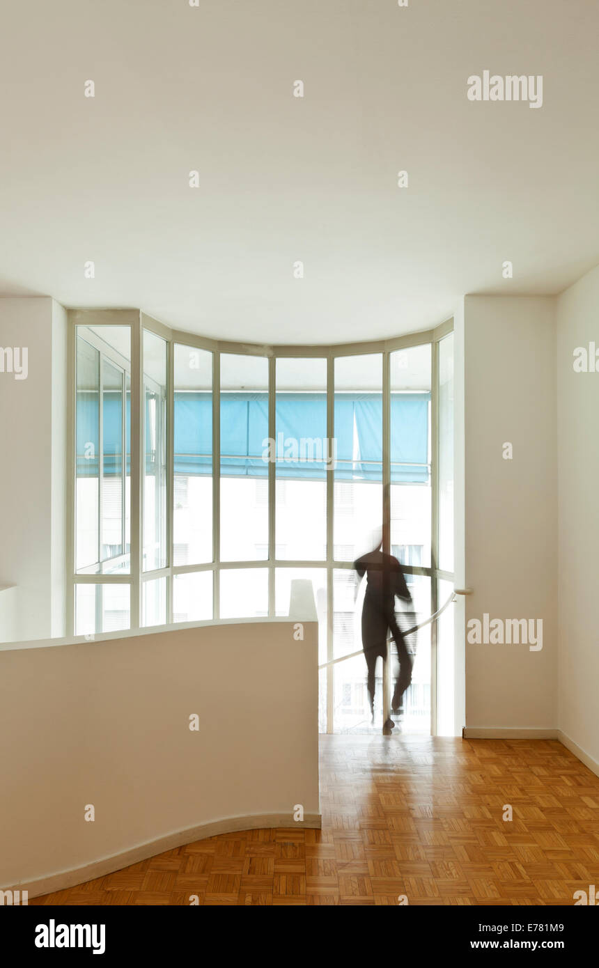 Bright duplex with hardwood floors, wide room with large window Stock ...