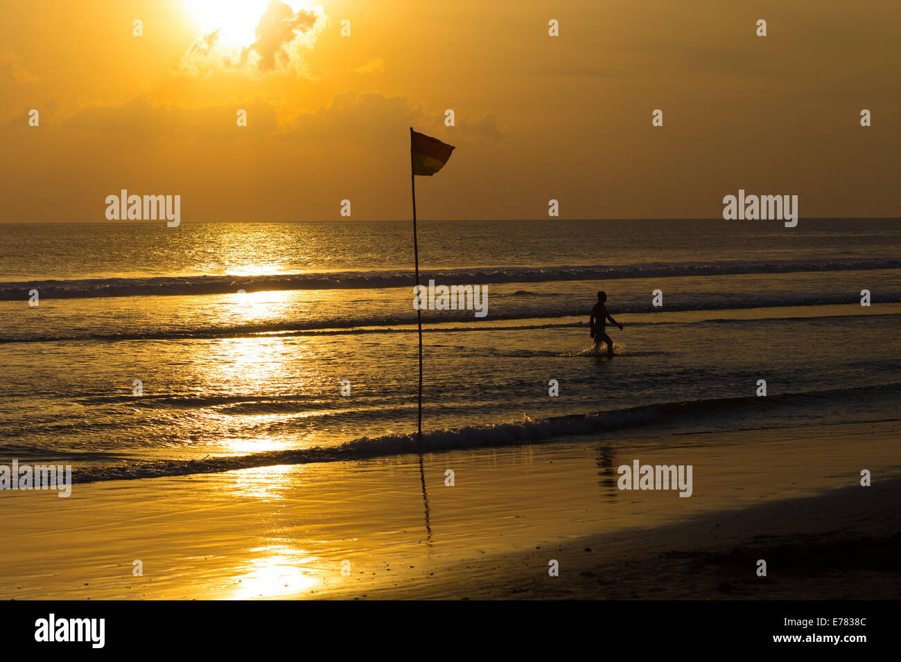 Tropical sunset on the beach. Bali island. Indonesia Stock Photo - Alamy