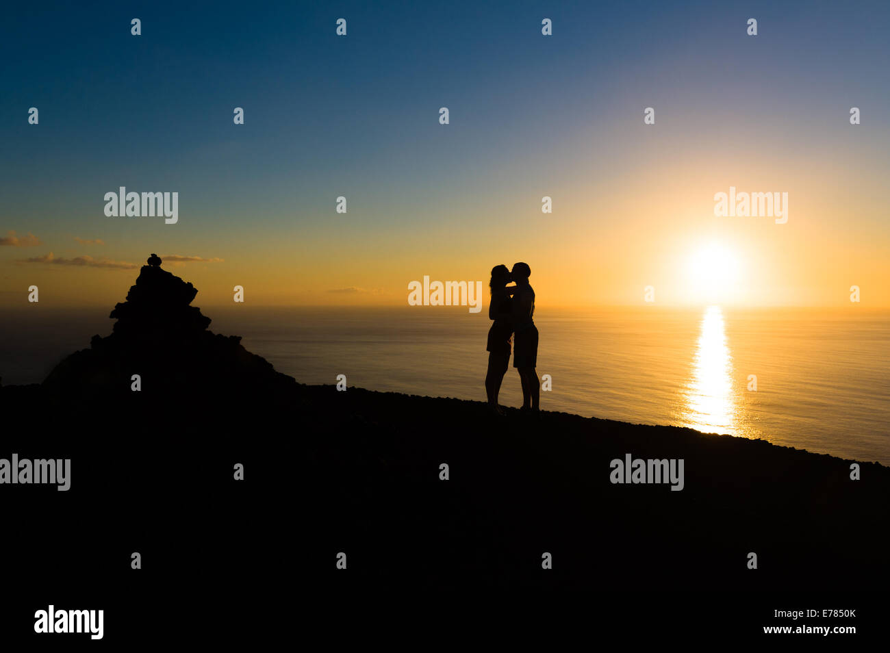 Romantic couple beautiful sunset on hi-res stock photography and images ...